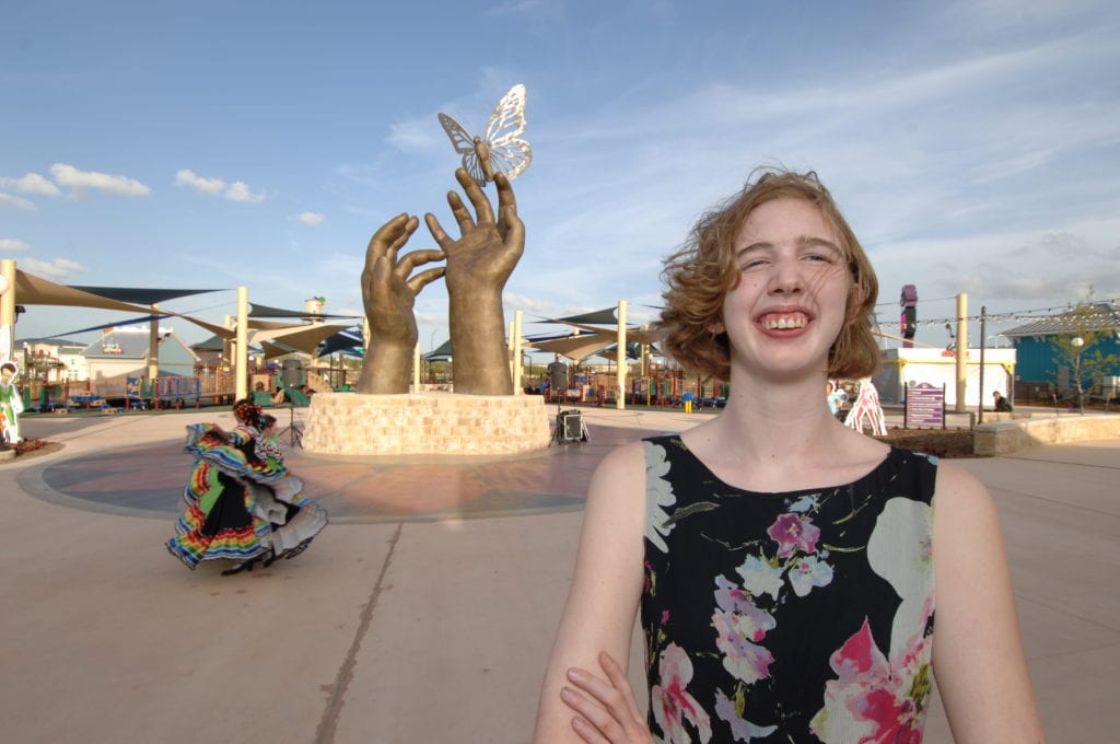 Morgan in front of sculpture - Gordon Hartman Family Foundation